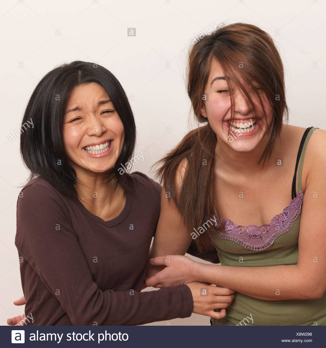 Tickling Laughing High Resolution Stock Photography and Images - Alamy