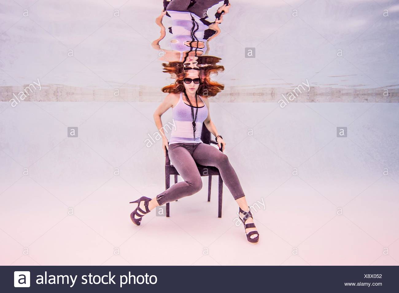 Swimming In Pool Wearing Her High Heels Photo Stock Photos & Swimming ...