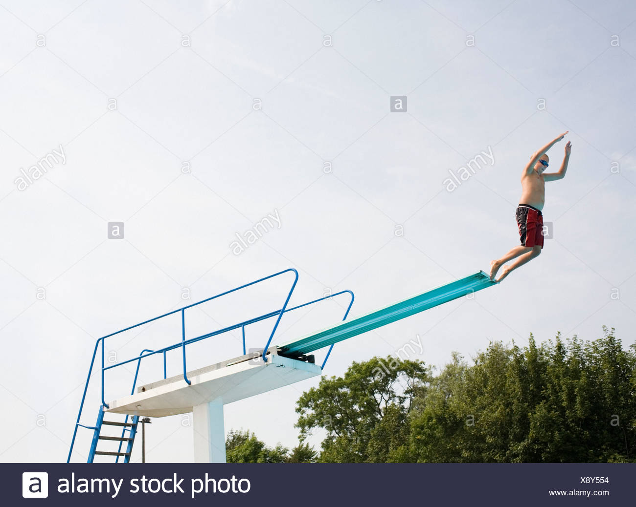 Boy On Diving Board High Resolution Stock Photography and Images - Alamy