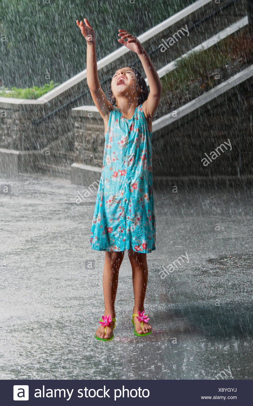 Playing In The Rain High Resolution Stock Photography and Images - Alamy