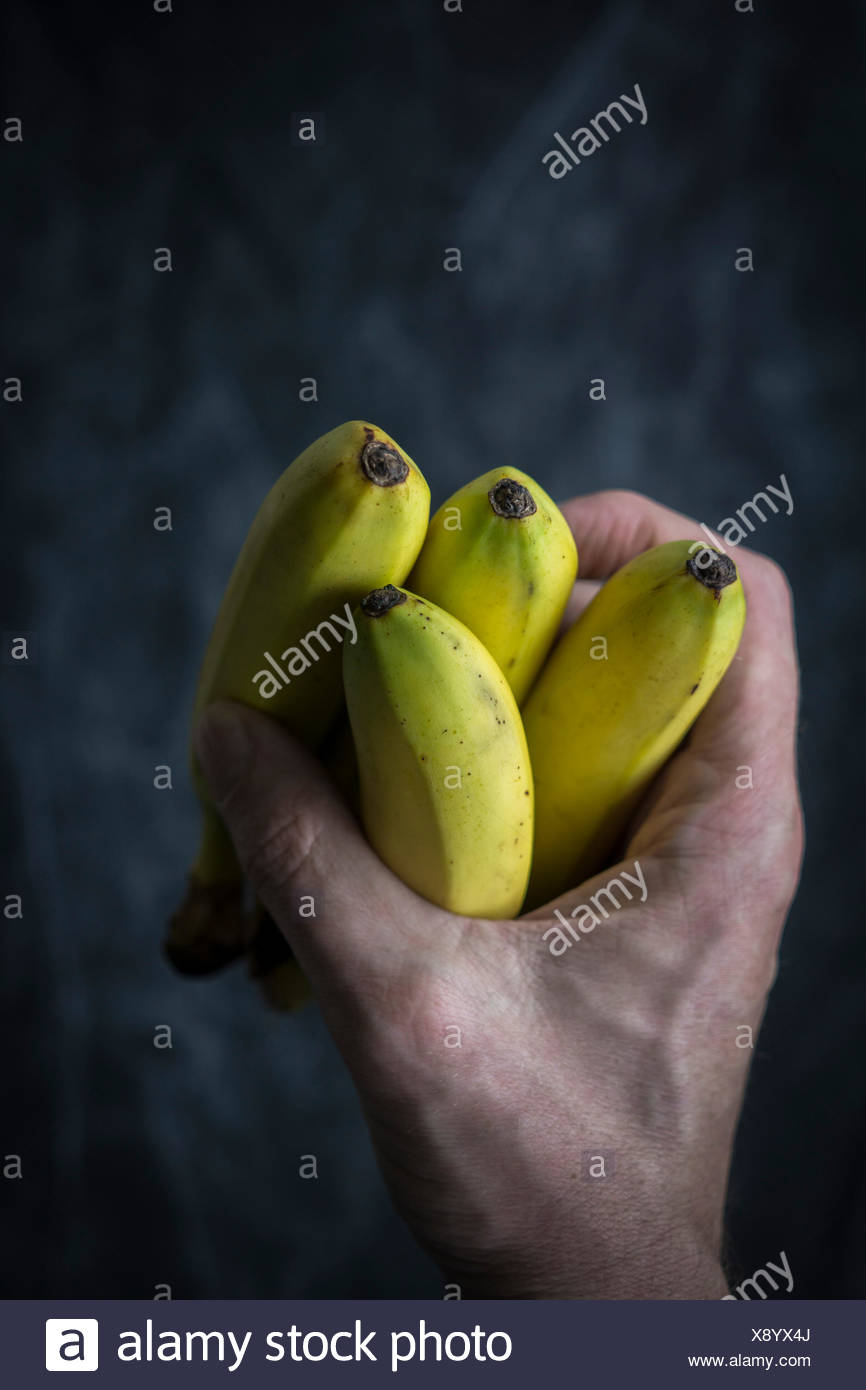 Hand Of Bananas Stock Photos & Hand Of Bananas Stock Images - Alamy