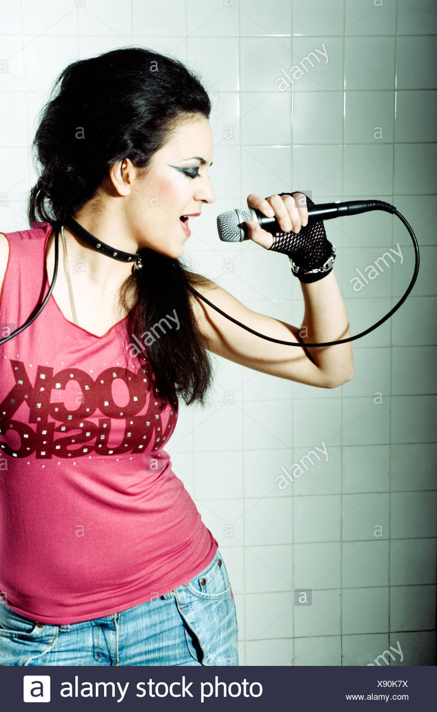 Punk Girl Singing Into Microphone High Resolution Stock Photography and ...
