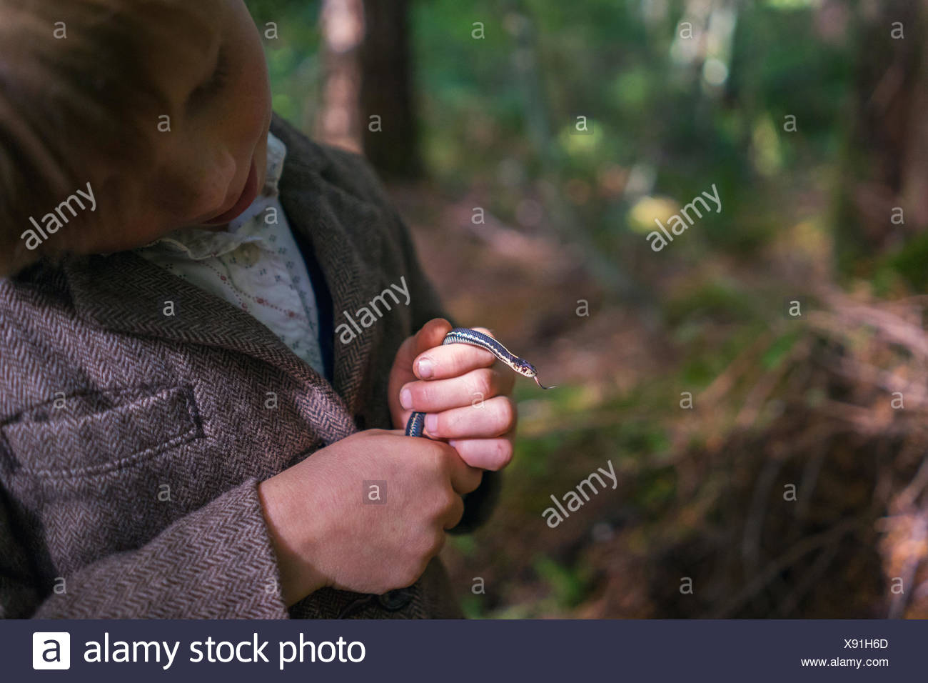 Boy Holding A Snake High Resolution Stock Photography and Images - Alamy