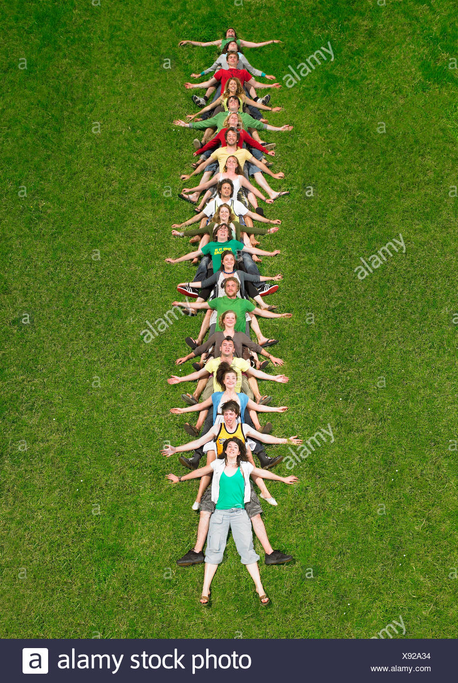 Group Laying Down On Grass High Resolution Stock Photography and Images ...