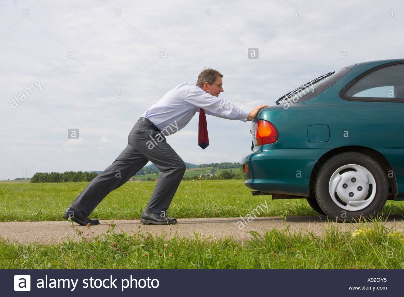 Pushing A Car High Resolution Stock Photography and Images - Alamy