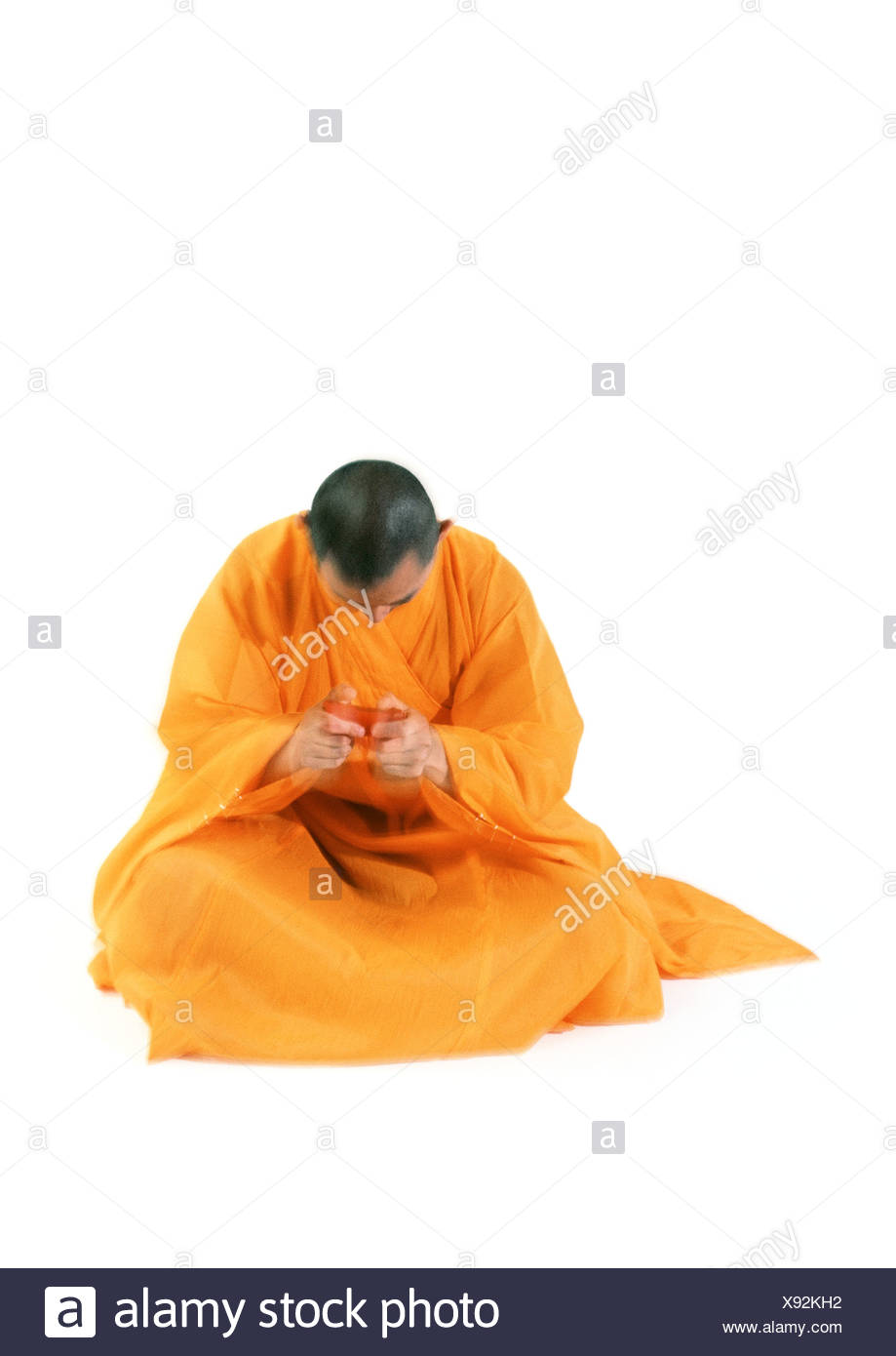 Tibetan Buddhist Monk Holding Prayer High Resolution Stock Photography ...