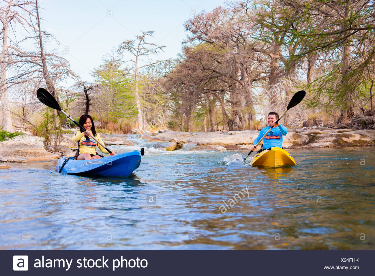 Man And Woman Canoeing High Resolution Stock Photography and Images - Alamy