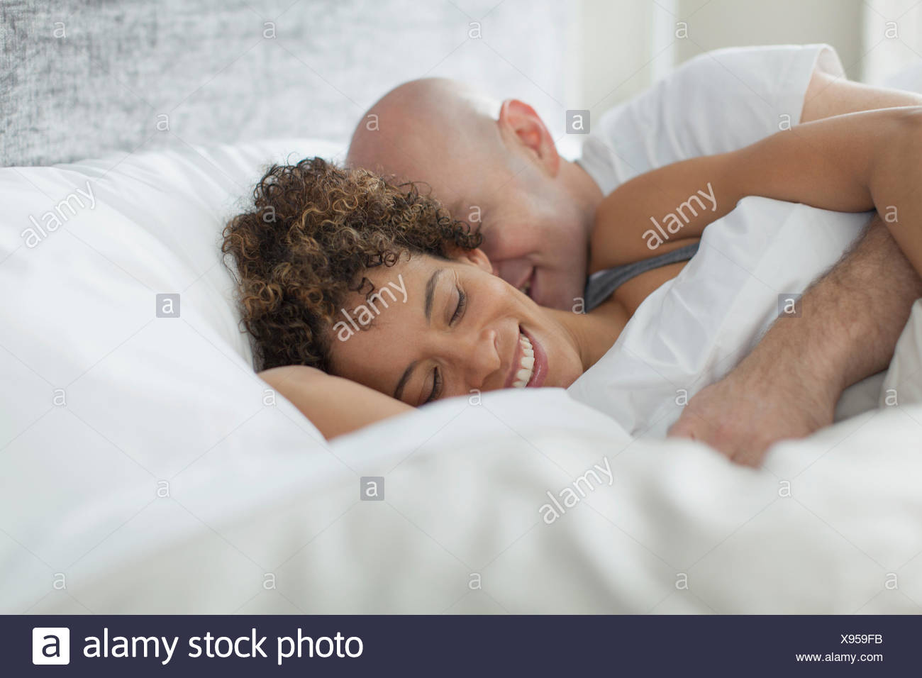 Snuggled Up In Bed Stock Photos & Snuggled Up In Bed Stock Images - Alamy