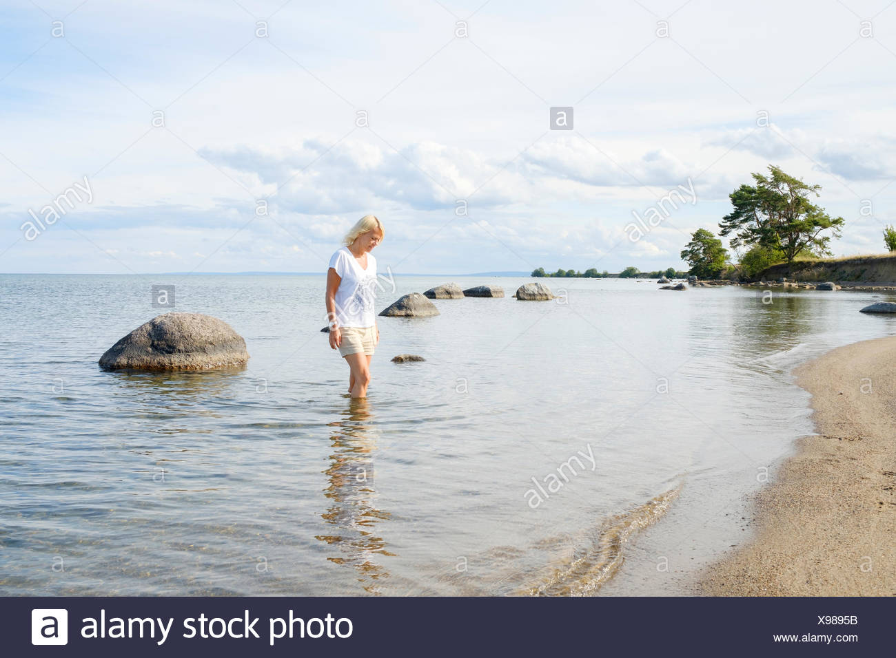 Mature Woman Wading In Water High Resolution Stock Photography and ...