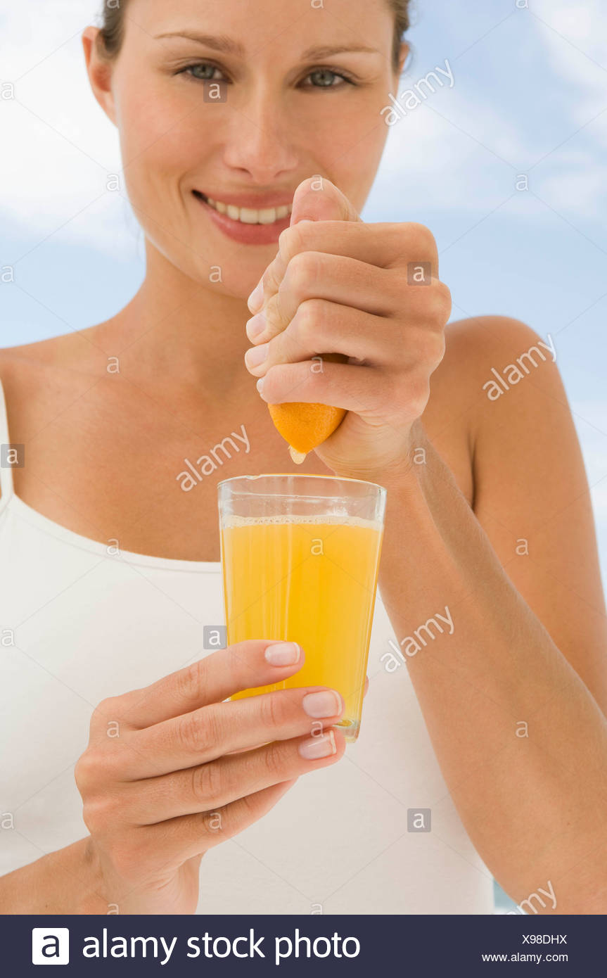 Squeezing Orange Juice High Resolution Stock Photography and Images - Alamy