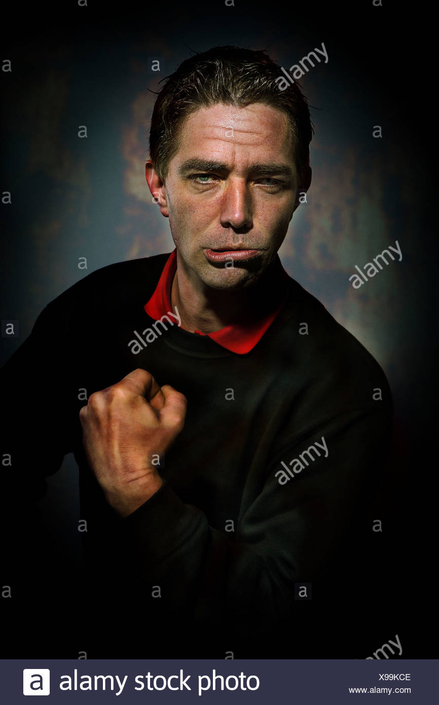 Clenched Face High Resolution Stock Photography and Images - Alamy