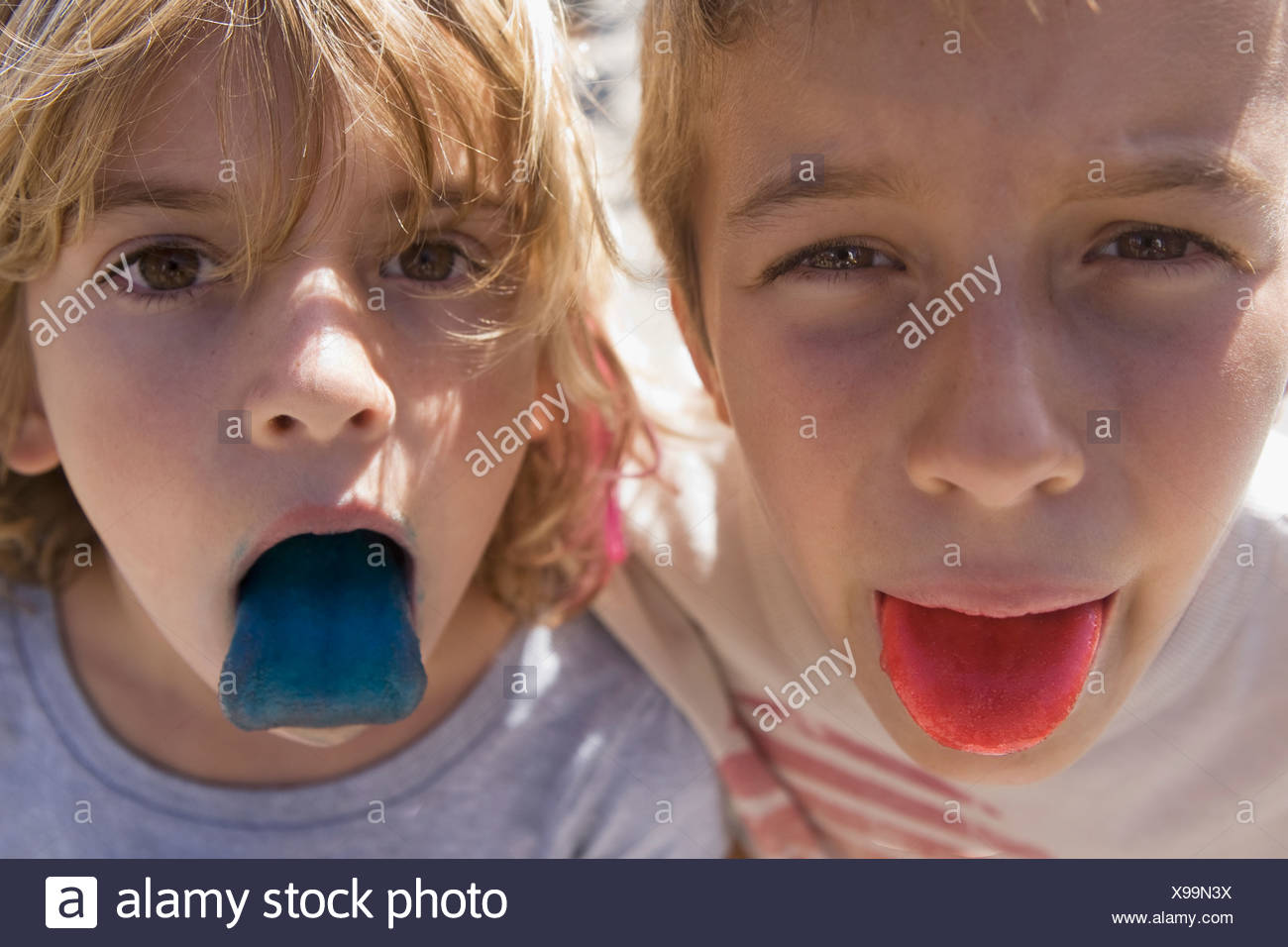 Two Girls Sticking Tongues Out Stock Photos & Two Girls Sticking ...