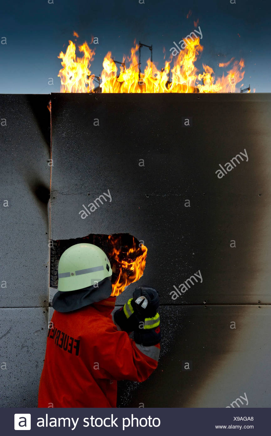 Fireman Behind Flames Stock Photos & Fireman Behind Flames Stock Images ...