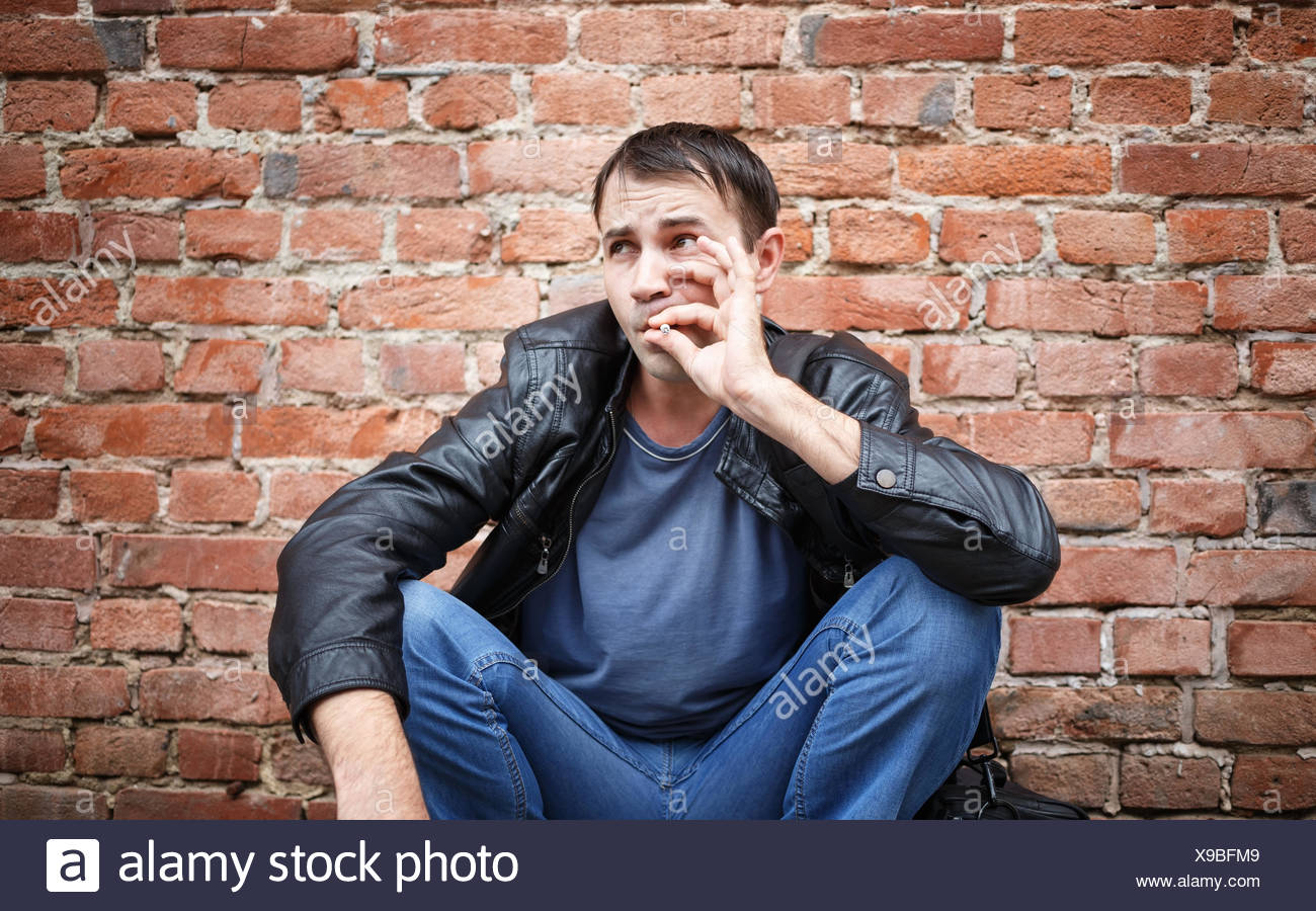 Squatting Male Model High Resolution Stock Photography and Images - Alamy