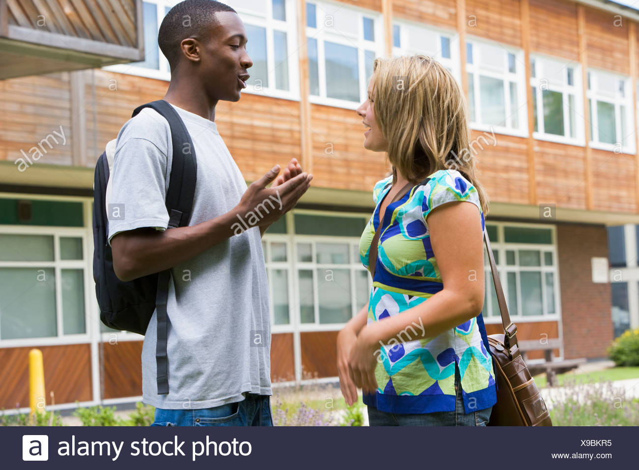 Two People Facing Each Other Talking High Resolution Stock Photography ...