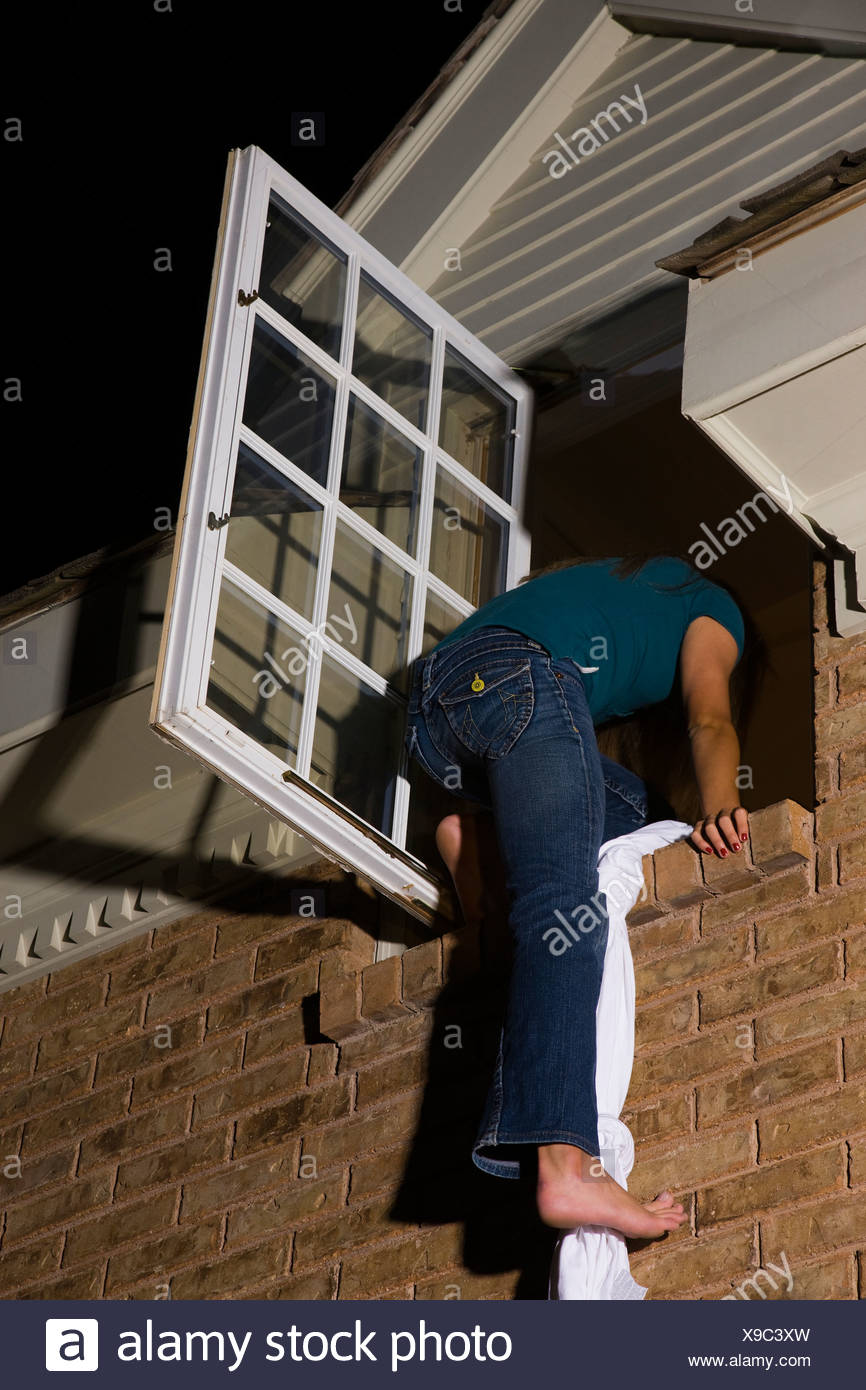 Girl Climbing Window High Resolution Stock Photography and Images - Alamy
