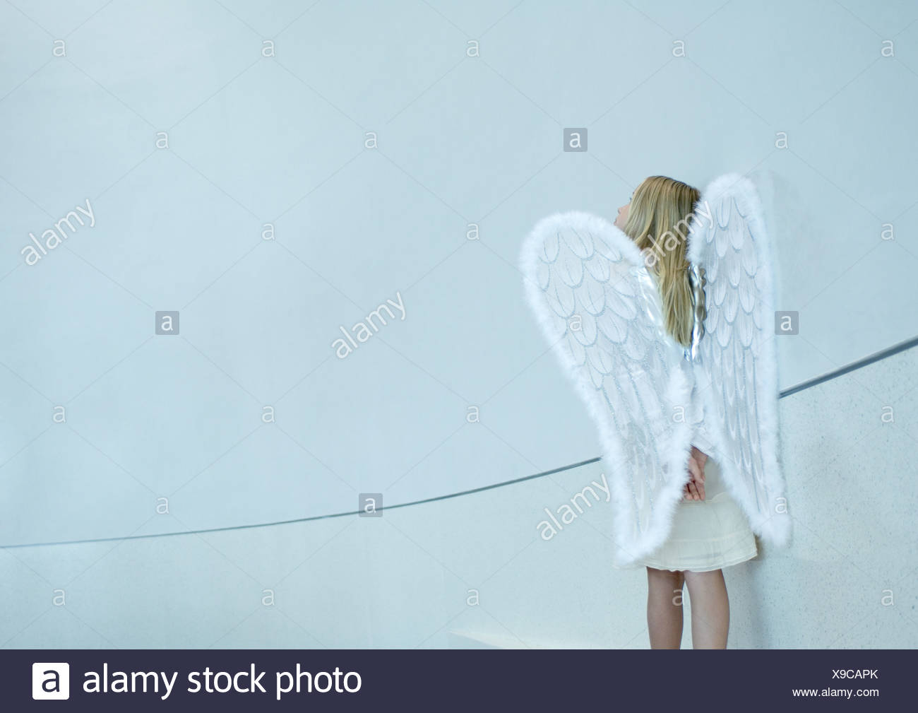 Wearing Angels Wings High Resolution Stock Photography and Images - Alamy