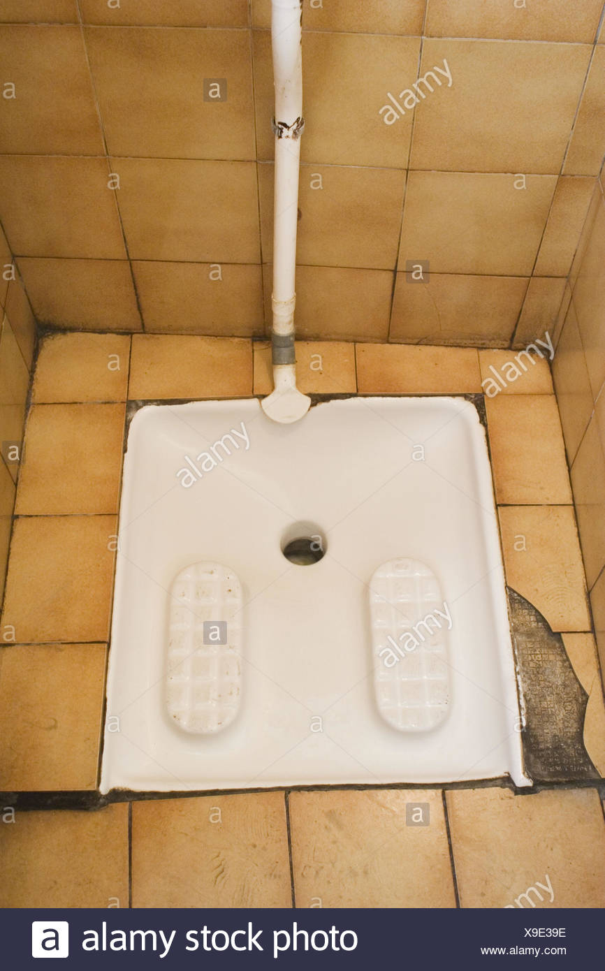 Squatting Inside High Resolution Stock Photography and Images - Alamy