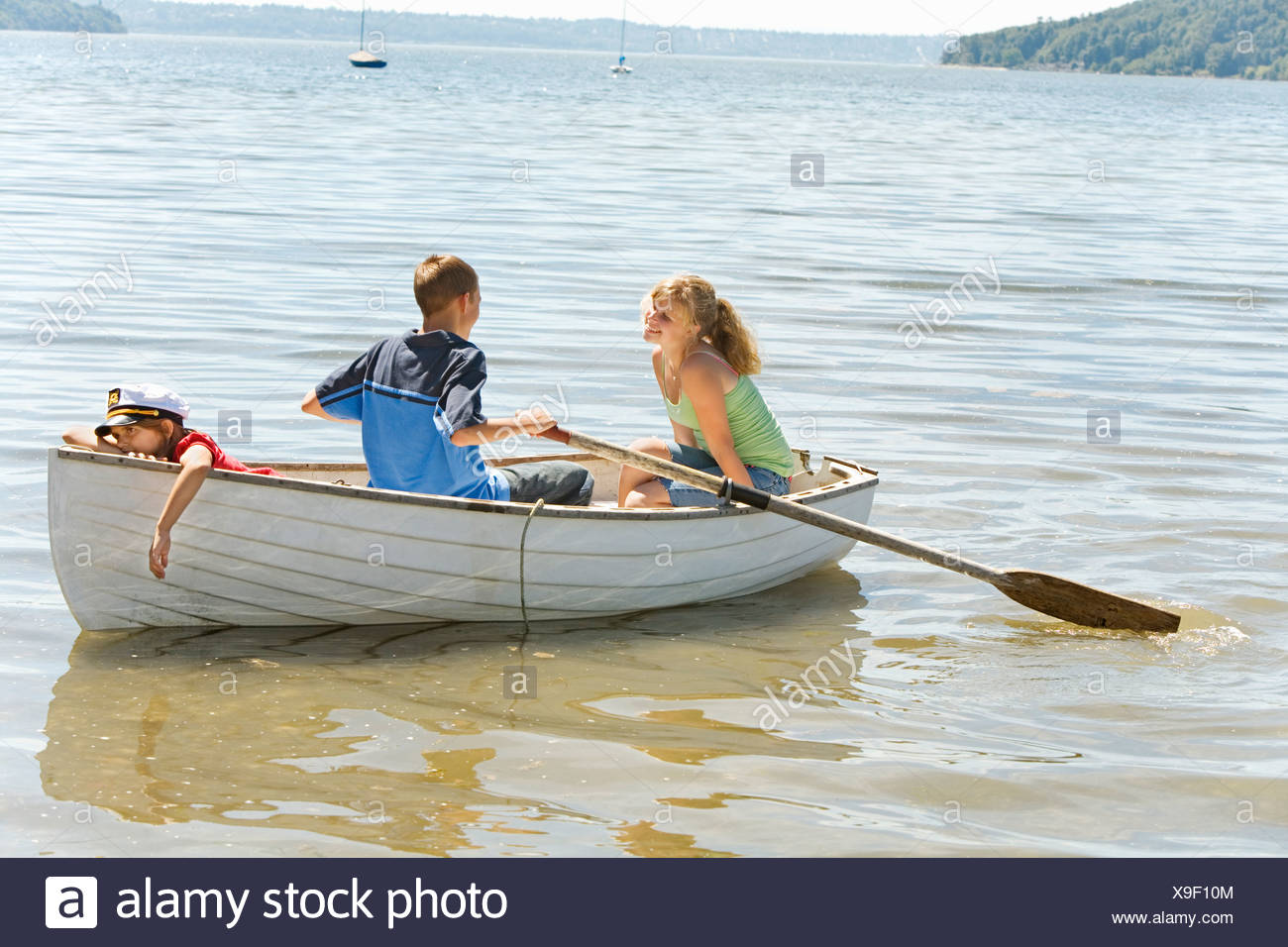 Boy Girl In Row Boat Stock Photos & Boy Girl In Row Boat Stock Images ...