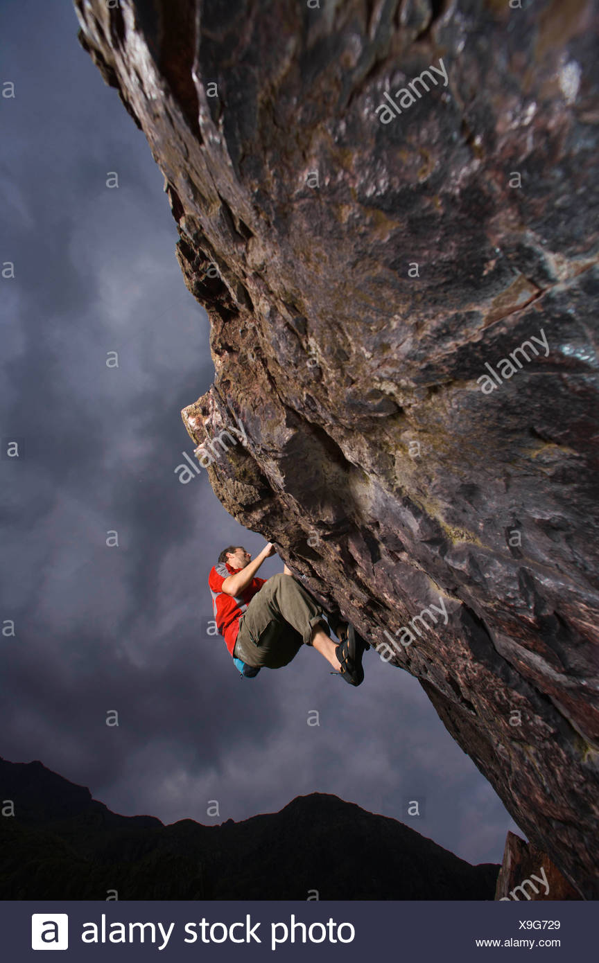 Man Climbing Rock Face High Resolution Stock Photography and Images - Alamy
