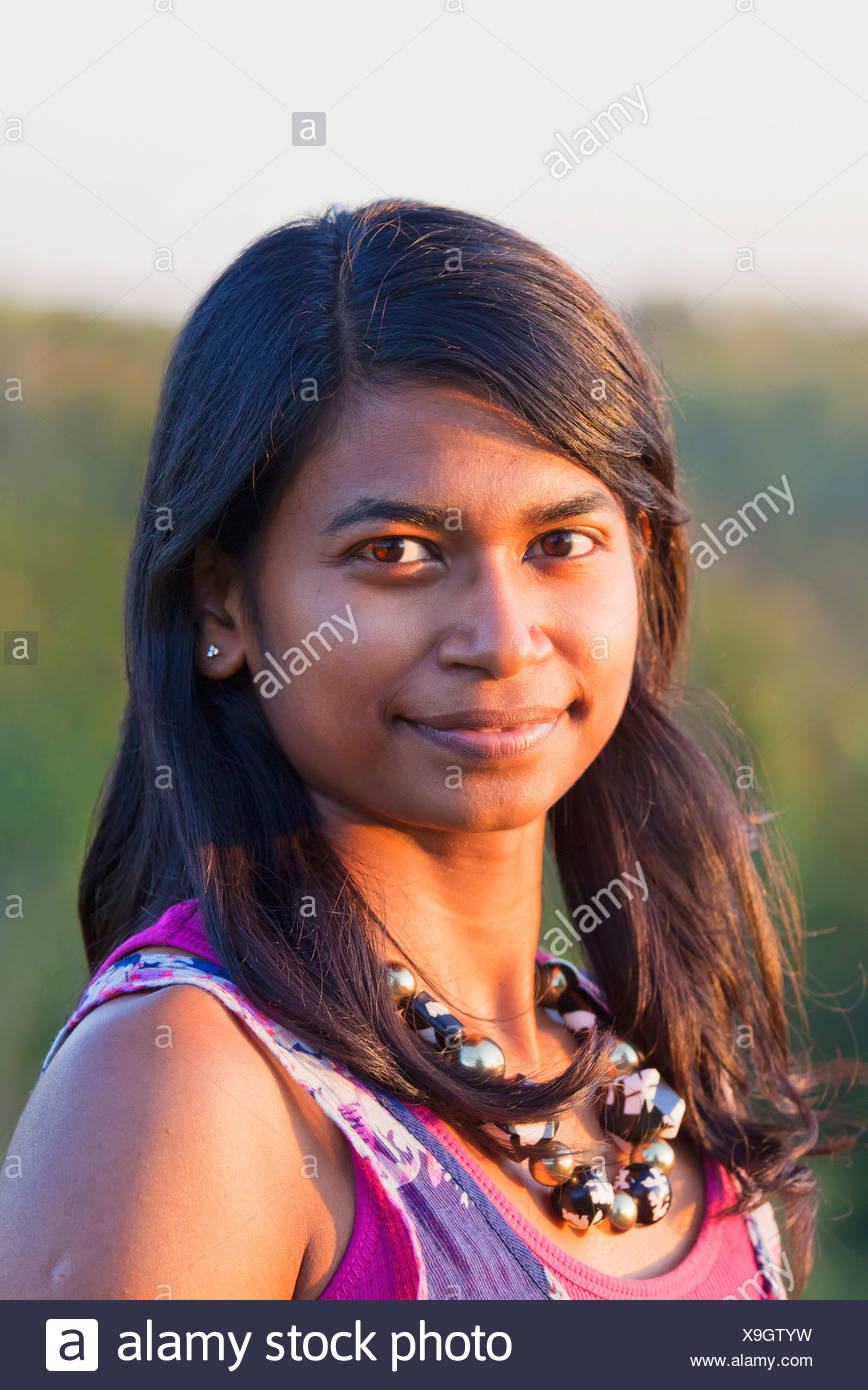 Portrait Of A Young Woman With Necklace Smile Indian Stock Photos ...