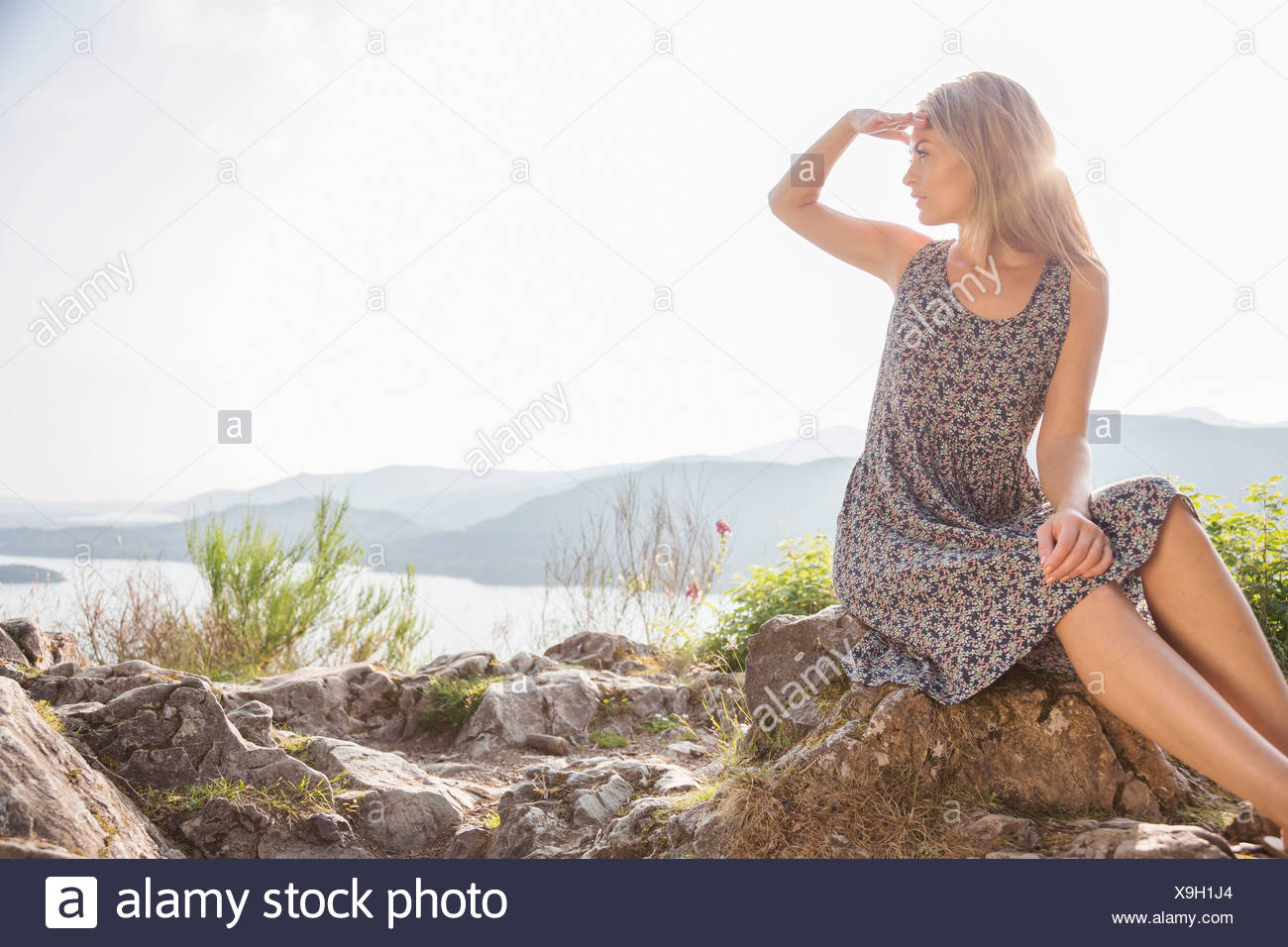 Shielding Eyes Sun Stock Photos & Shielding Eyes Sun Stock Images - Alamy