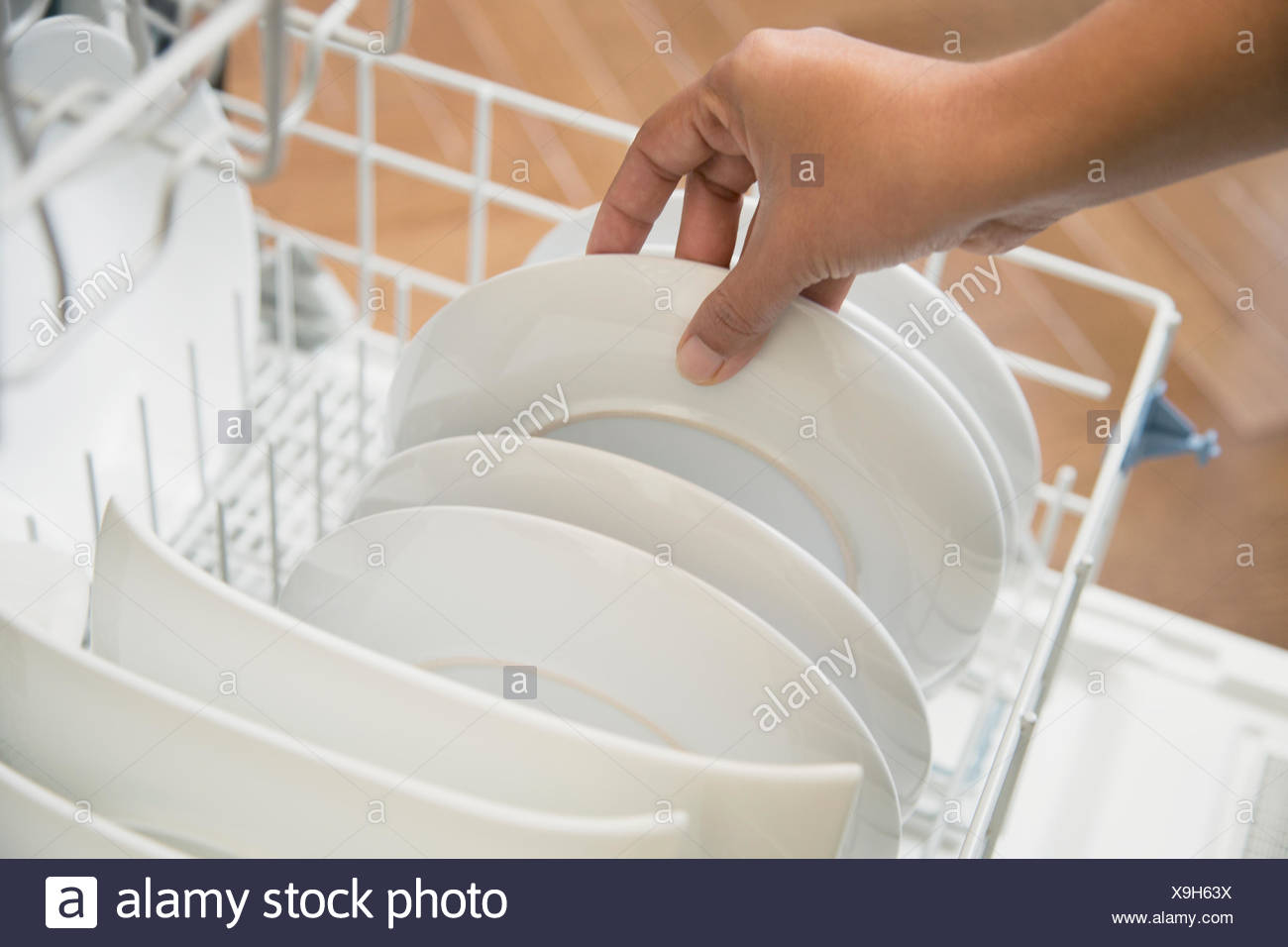 Unloading Dishwasher Stock Photos & Unloading Dishwasher Stock Images ...