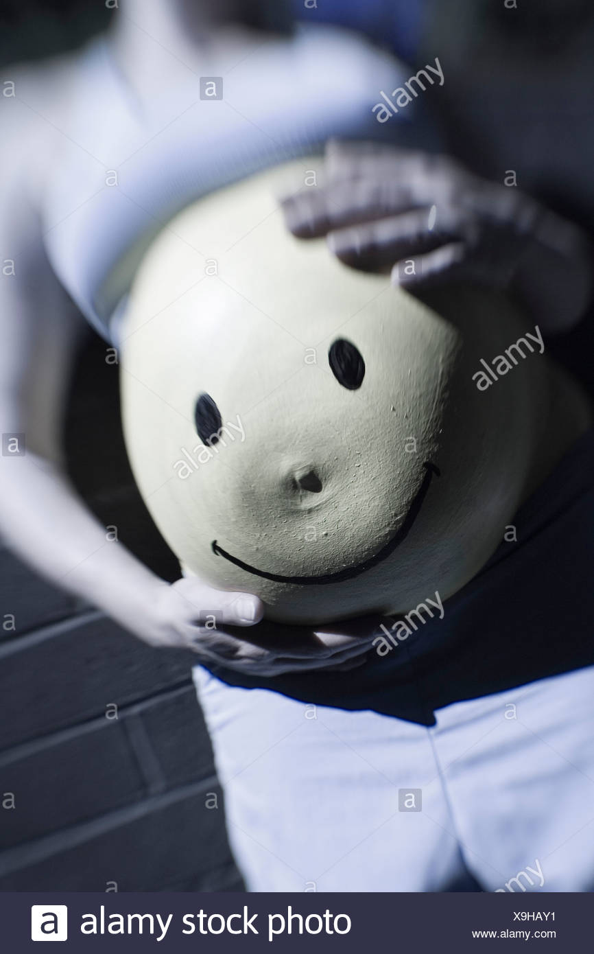 Smiley Face On Stomach High Resolution Stock Photography and Images - Alamy
