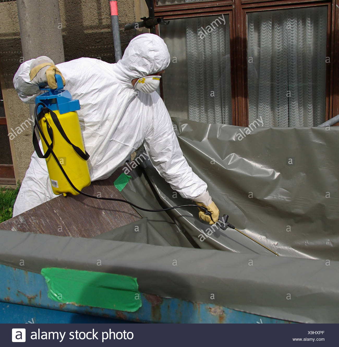Asbestos Removal Protective Suit Mask Stock Photos & Asbestos Removal ...