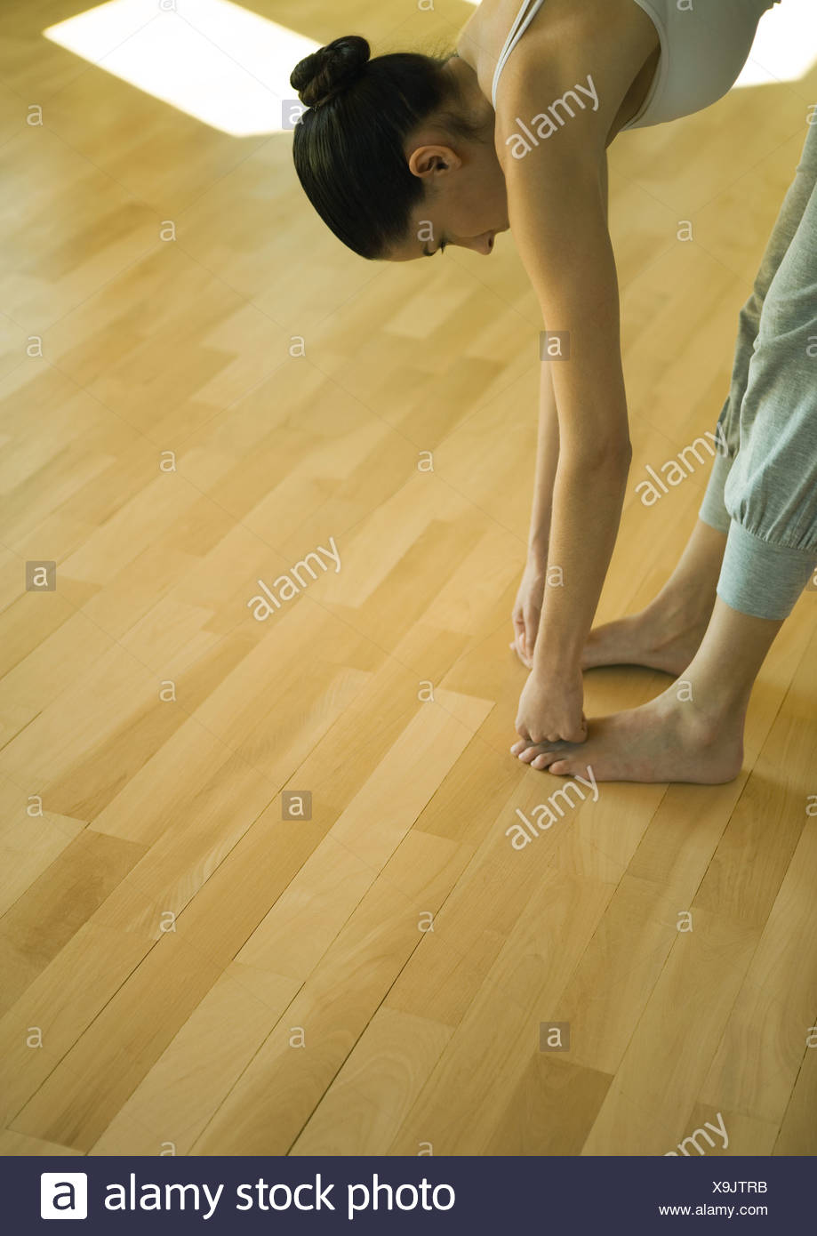 Woman Bending Over Touching Toes High Resolution Stock Photography and ...