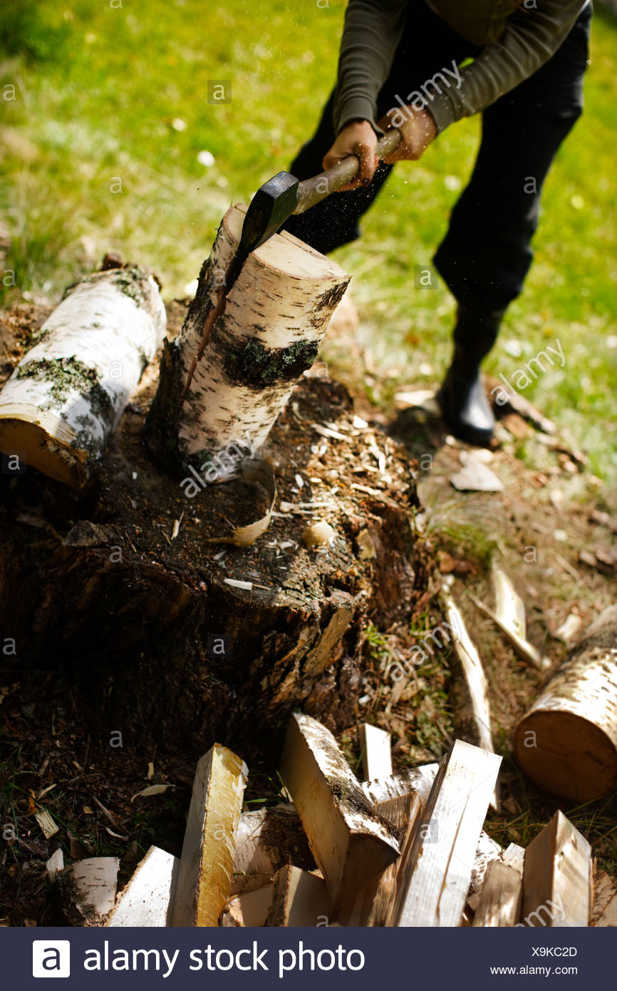 Woman Chopping Wood Outdoors High Resolution Stock Photography and ...