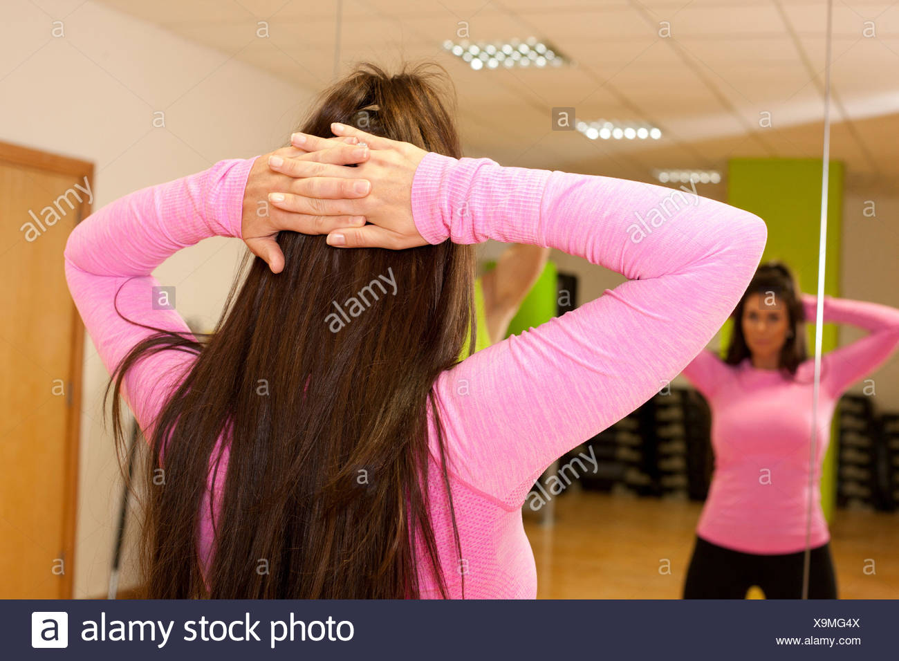 Female Rear View Hands On Head High Resolution Stock Photography and ...