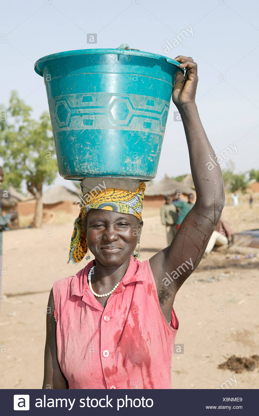 Women Carry Water Head High Resolution Stock Photography and Images - Alamy