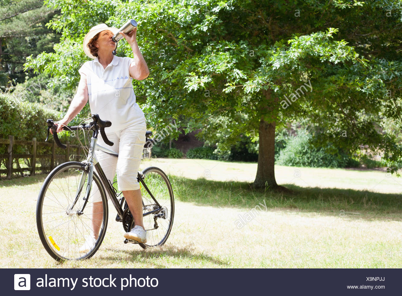Old Woman Cyclist High Resolution Stock Photography and Images - Alamy