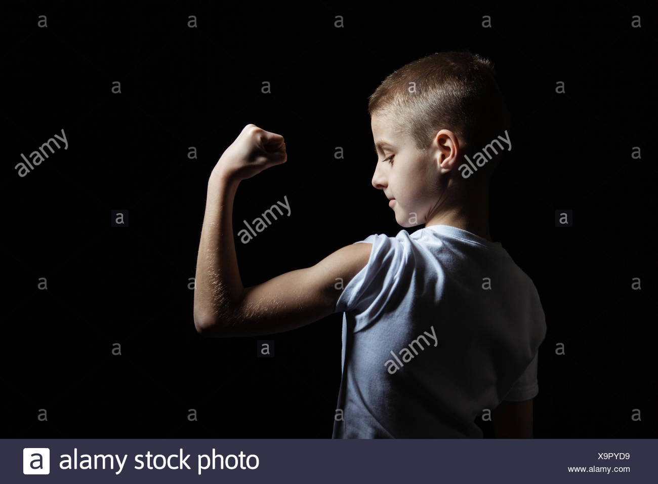 Boy Flexing Biceps High Resolution Stock Photography and Images - Alamy