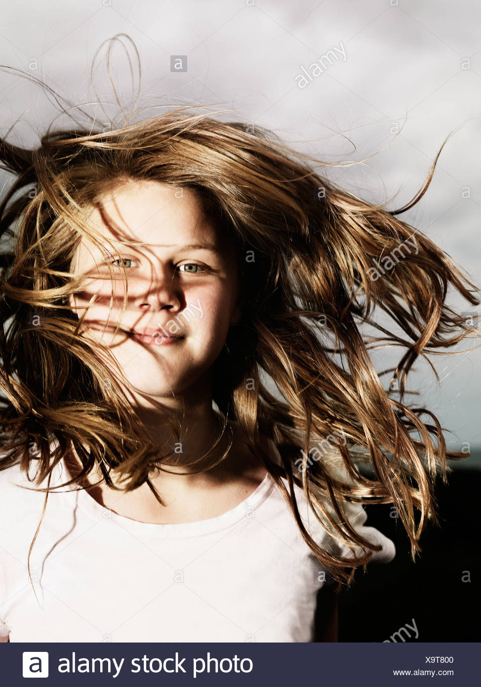 Girls Hair Blowing In The Wind High Resolution Stock Photography and ...