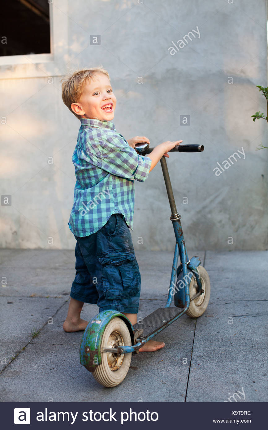 Child Scooter High Resolution Stock Photography and Images - Alamy