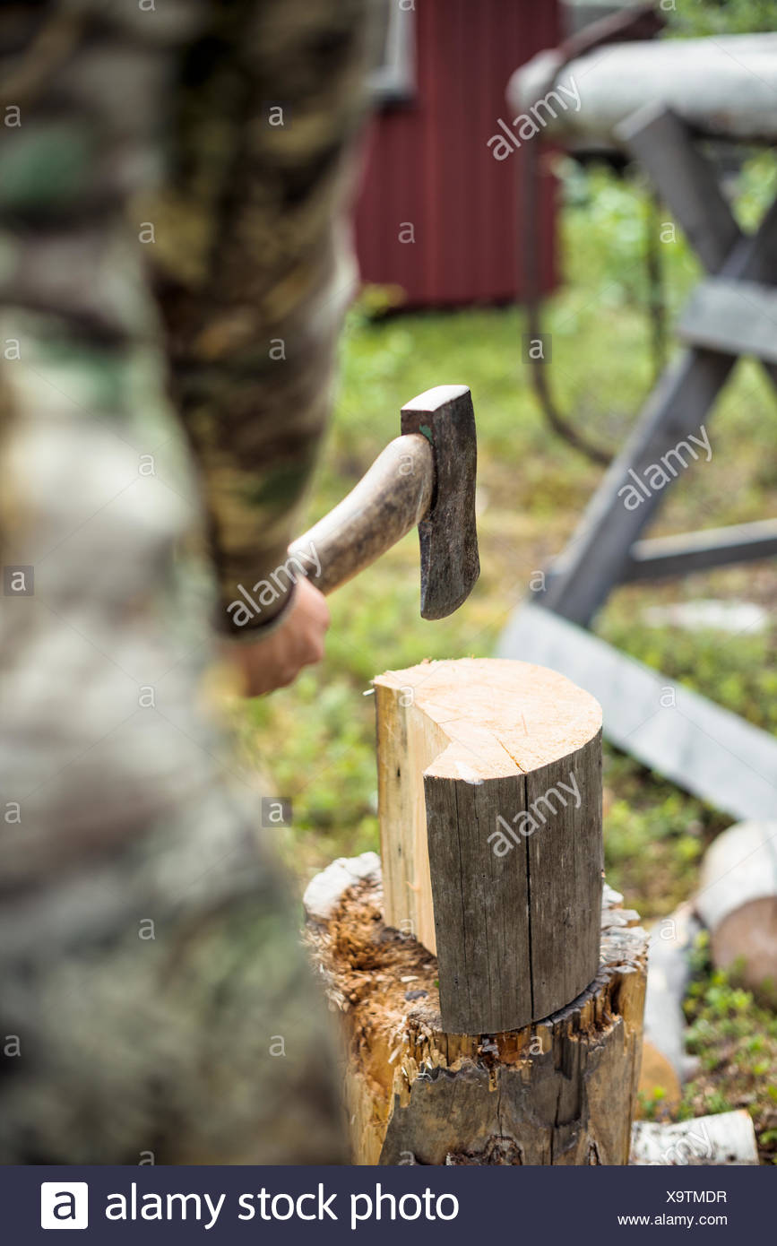 Woman Chopping Wood Outdoors High Resolution Stock Photography and ...