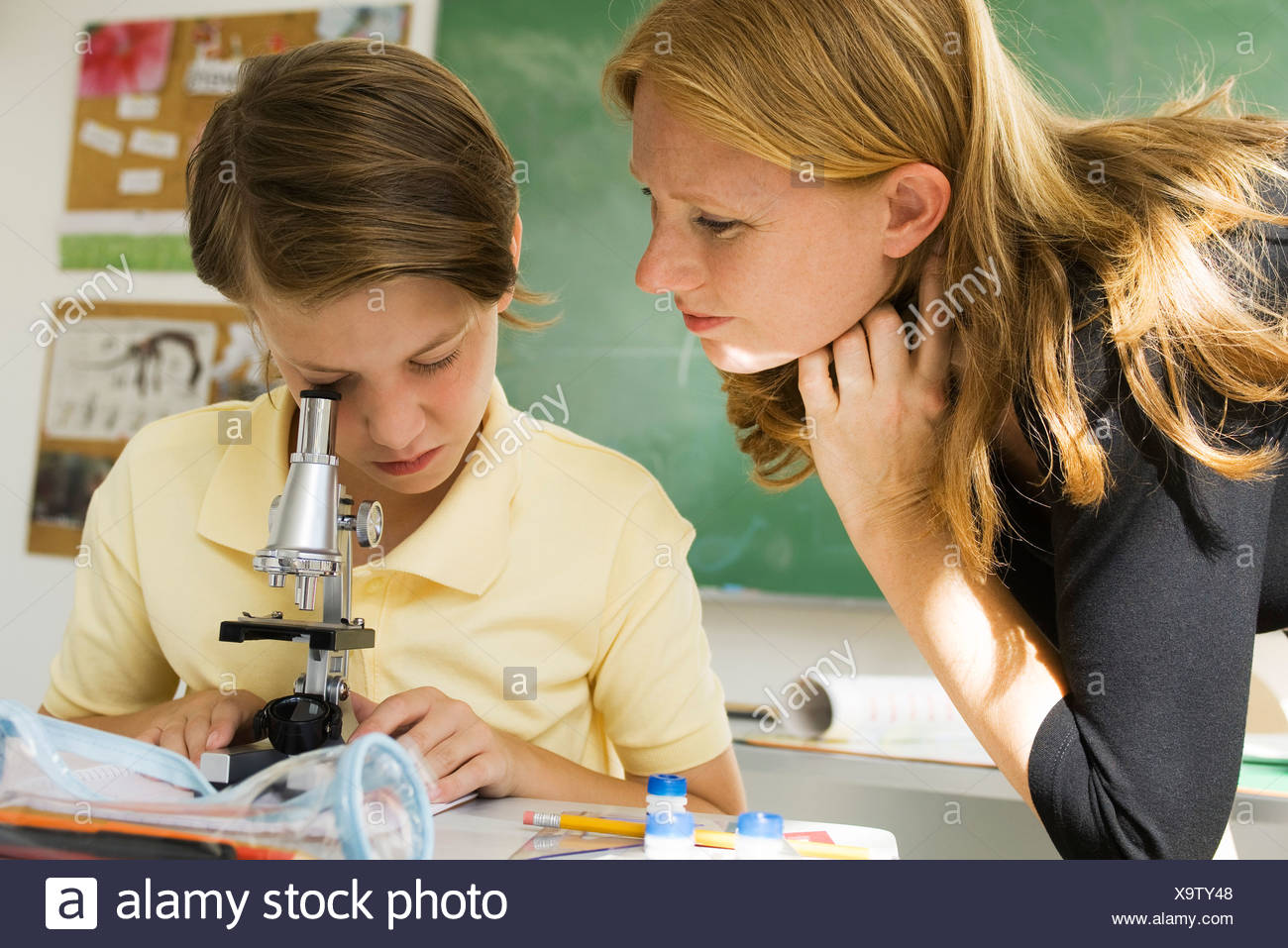 Woman Watching Over Children High Resolution Stock Photography and ...