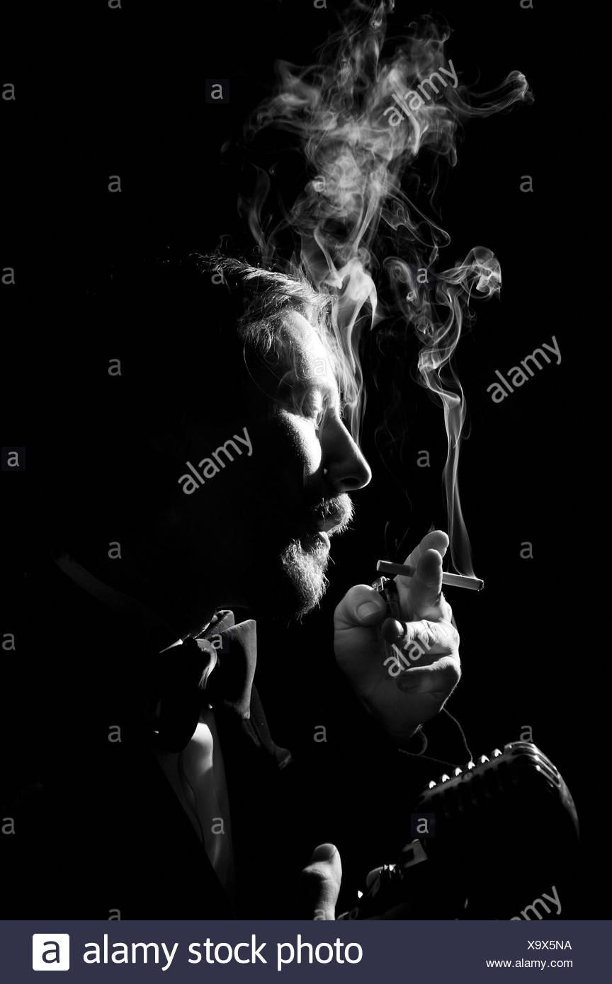 Man Smoking Cigarette Dark High Resolution Stock Photography and Images ...