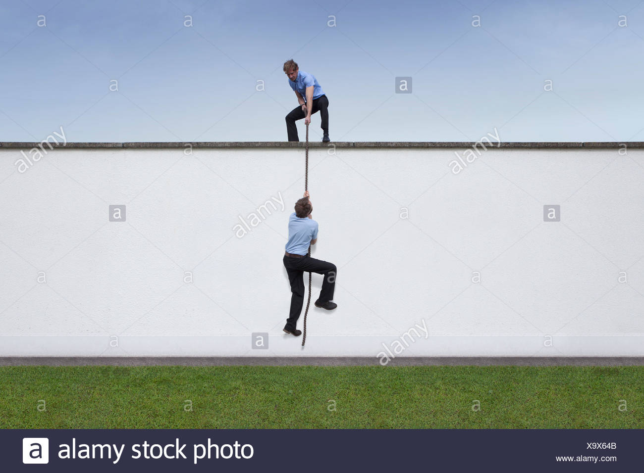 Climbing Over Wall Stock Photos & Climbing Over Wall Stock Images - Alamy