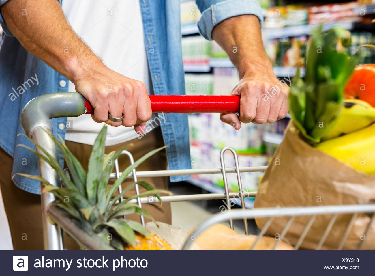 Man Pushing Trolley High Resolution Stock Photography and Images - Alamy