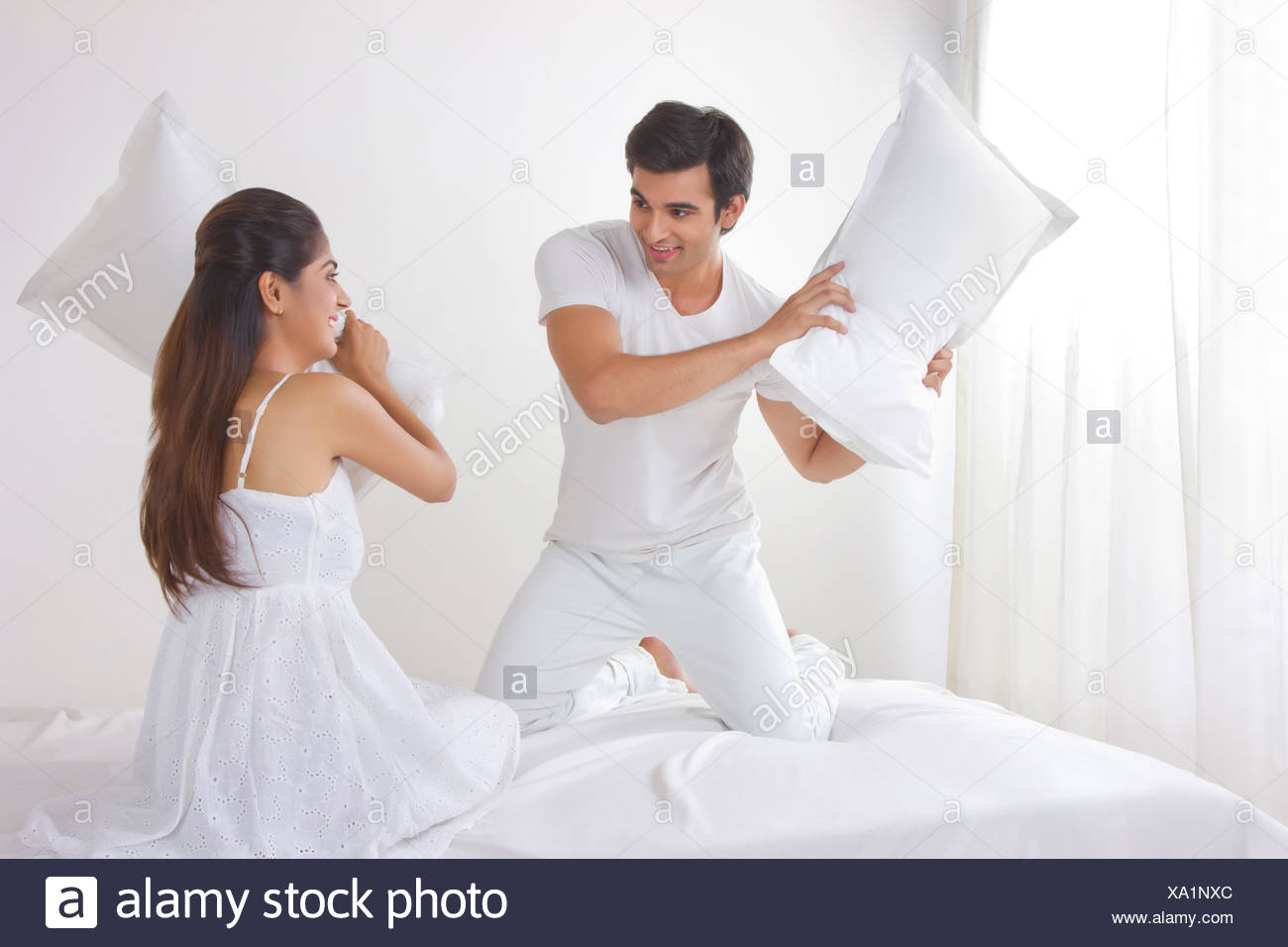 Couple Fight Bed High Resolution Stock Photography and Images - Alamy