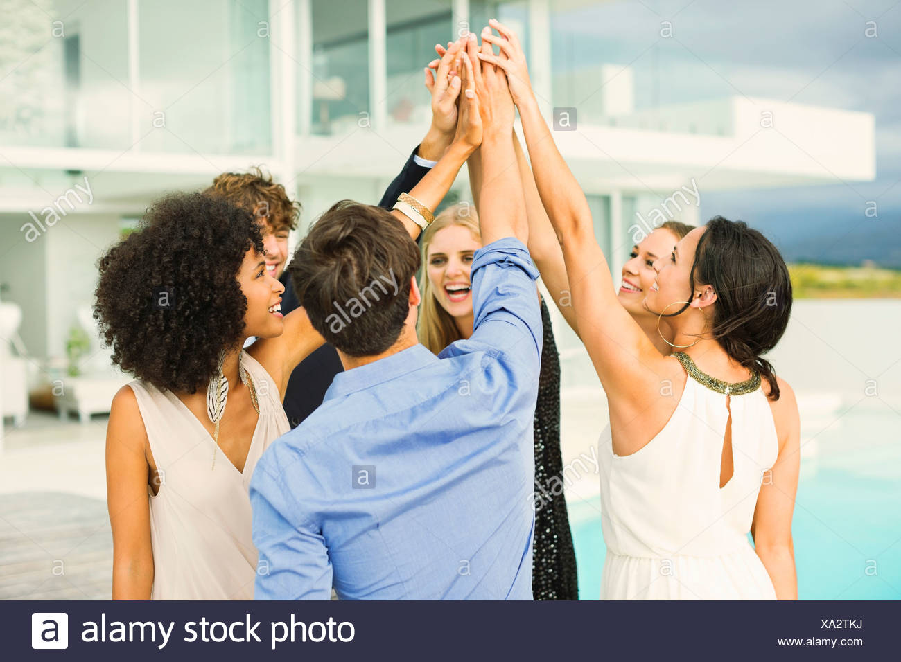 High Fiving People Stock Photos & High Fiving People Stock Images - Alamy