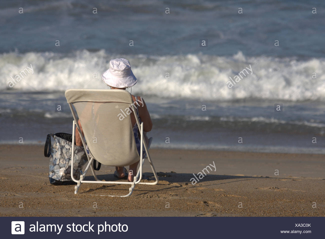 Elderly Lady Sitting In A Chair High Resolution Stock Photography and ...