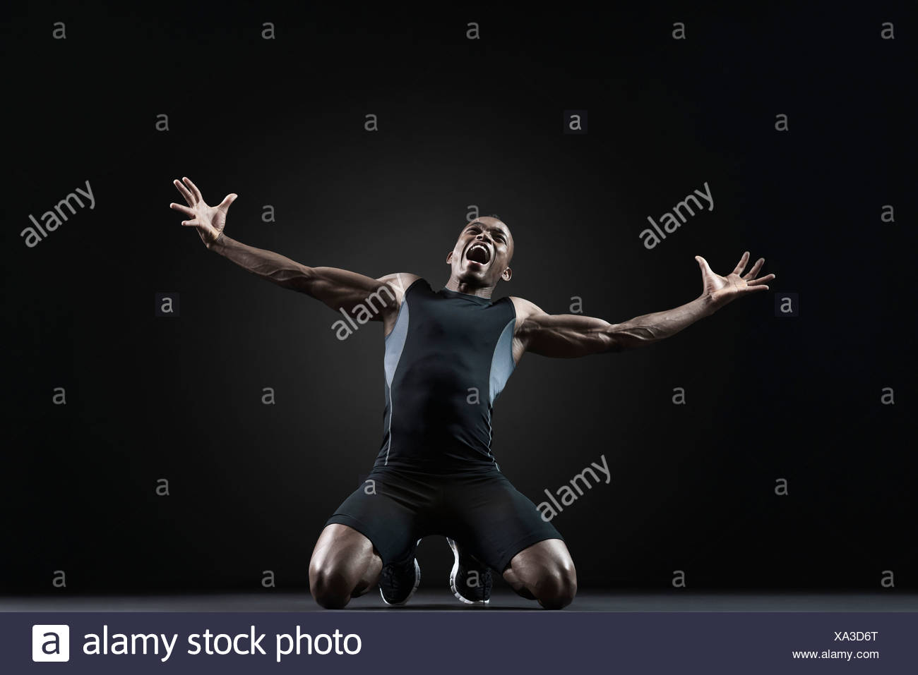 Person Kneeling With Arm Raised High Resolution Stock Photography and ...