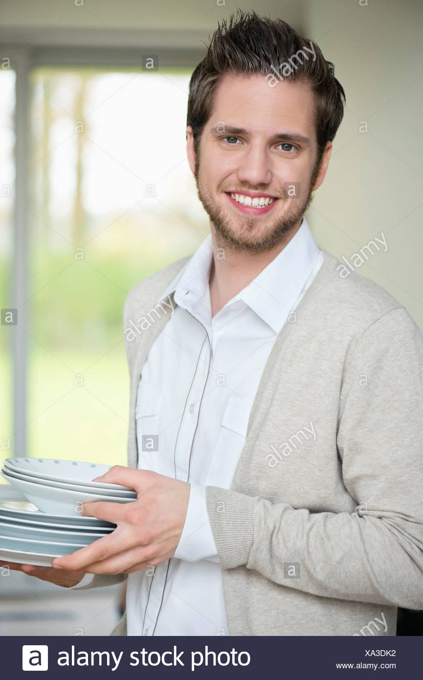 Carrying Plates Stock Photos & Carrying Plates Stock Images - Alamy