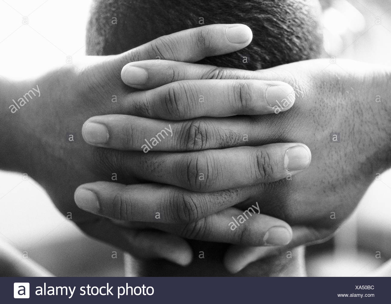 Hands Clasped Behind Back High Resolution Stock Photography and Images - Alamy