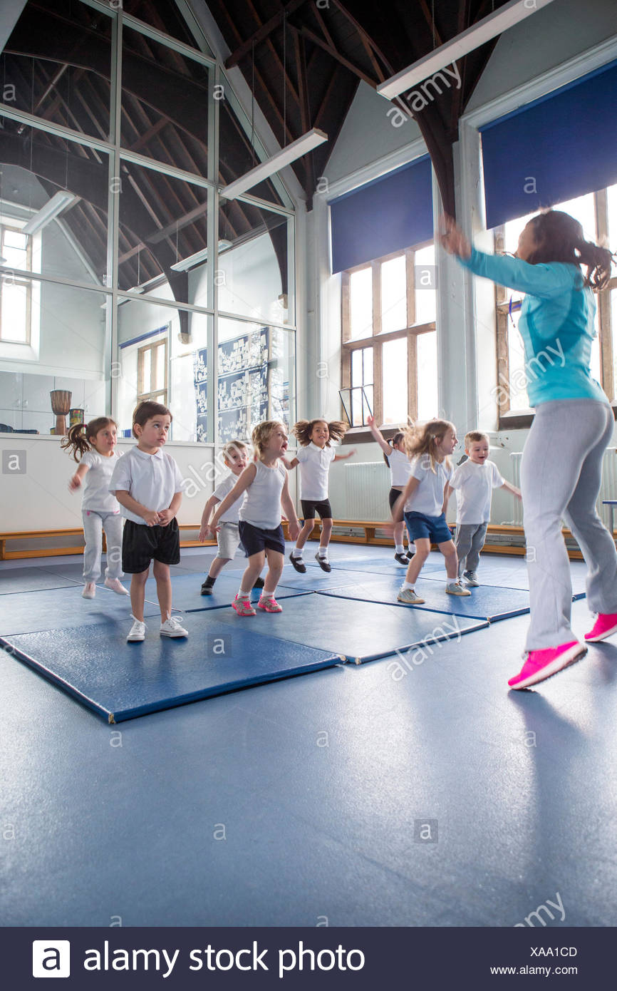 Physical Education Class Teacher High Resolution Stock Photography and ...