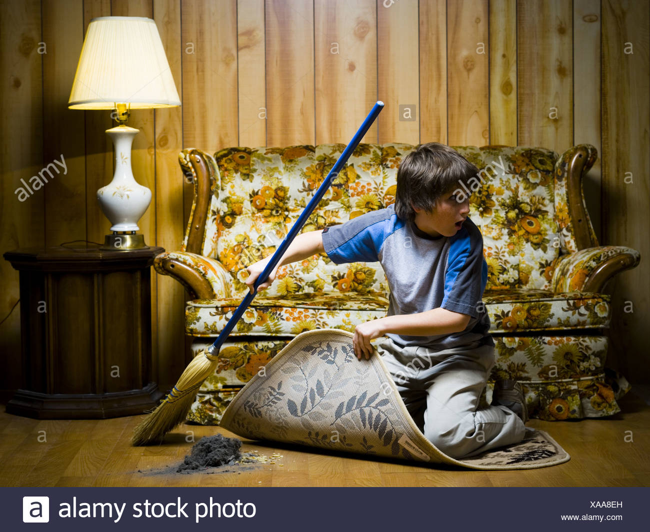 Boy Sweeping Ground High Resolution Stock Photography and Images - Alamy